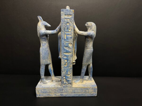 the triad of Rameses III, the god Horus and the god Seth performing the ...